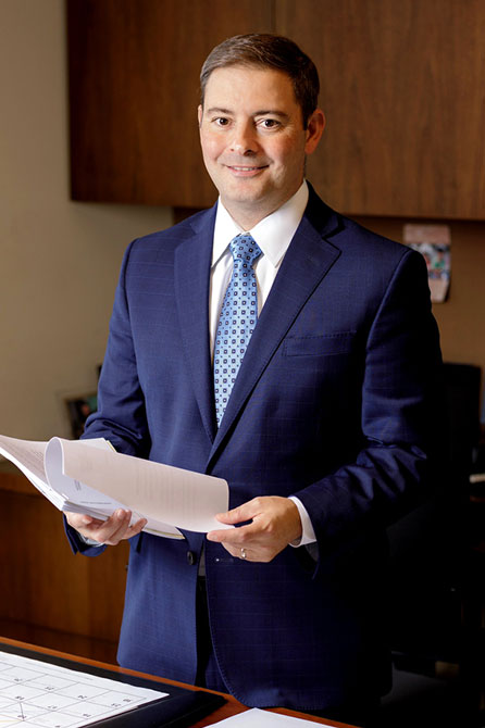 James C. Pullos - Clifford Law Offices